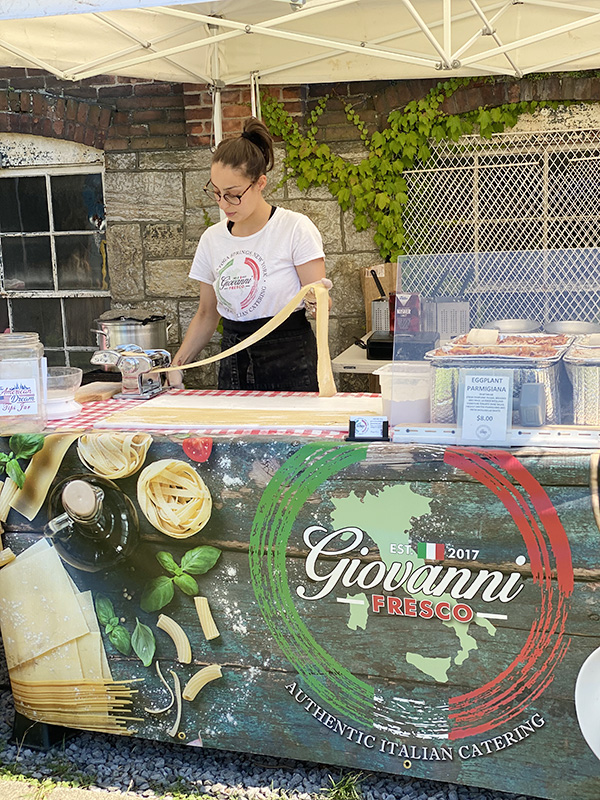 Crowd favorite Italian food booth at Shirt Factory Truck Corral buys ...